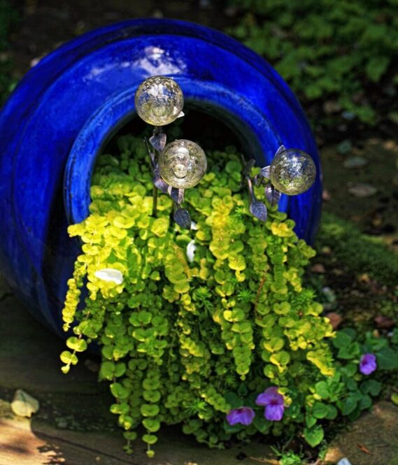 22 Creative Spilled Flower Pot Ideas for Your Outdoor Space